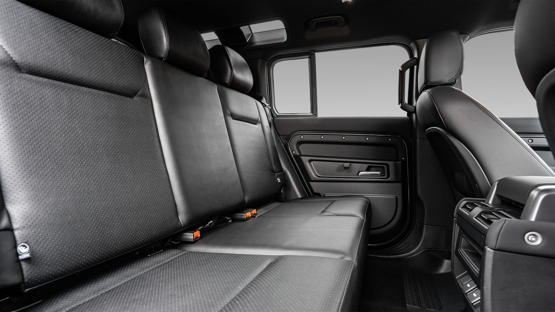Land Rover Defender Hard Top Rear Seat Conversion – Sterling Automotive Design